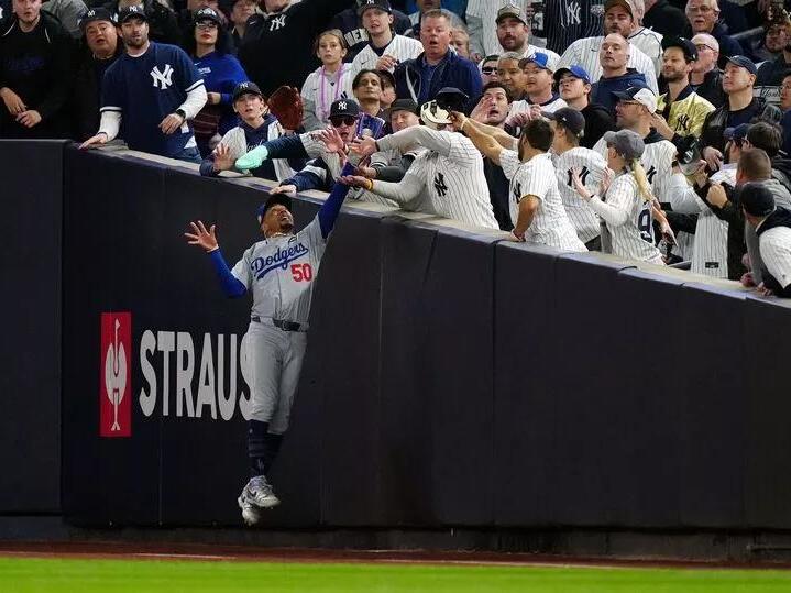 Yankees fan rips ball out of Mookie Betts' glove in another World Series interference incident