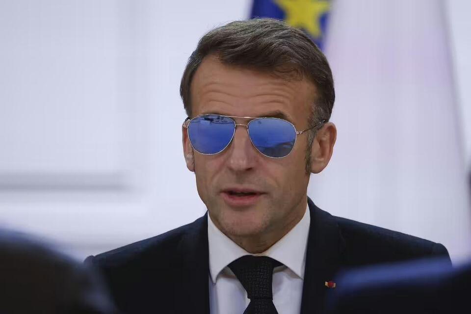 Macron appears in sunglasses and jokes about 'completely harmless' eye ...