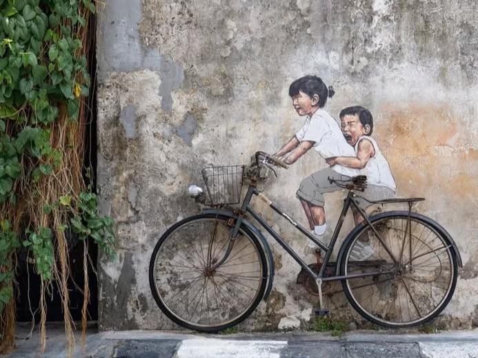 Street artist calls out AirAsia for using his work on aircraft without permission