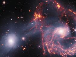 JWST Captures Stunning Merging Galaxies That Seem To Be Peering Back At Us