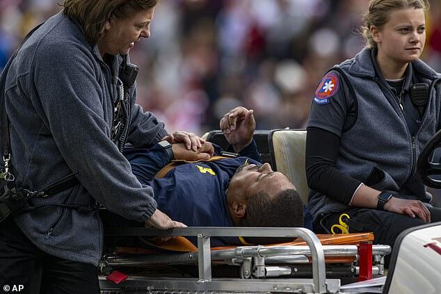 Michigan coach and ex-NFL running back Mike Hart, 36, is rushed to ...