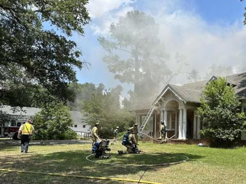 Crews responding after building catches fire in Anderson