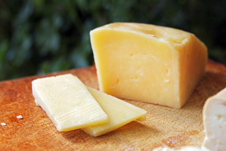 What Causes That Pink Color On Cheese—And Can You Still Eat It? - NewsBreak
