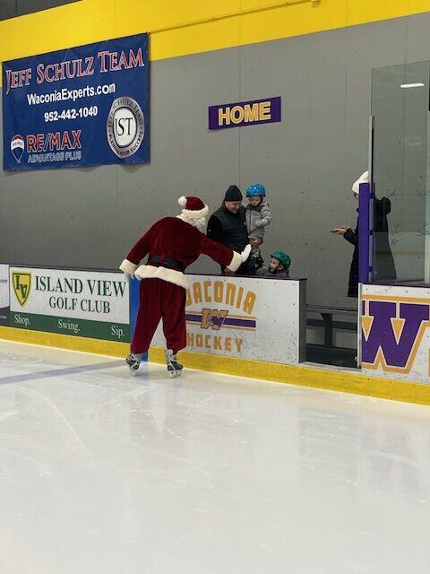 Santa hits the ice with area kids