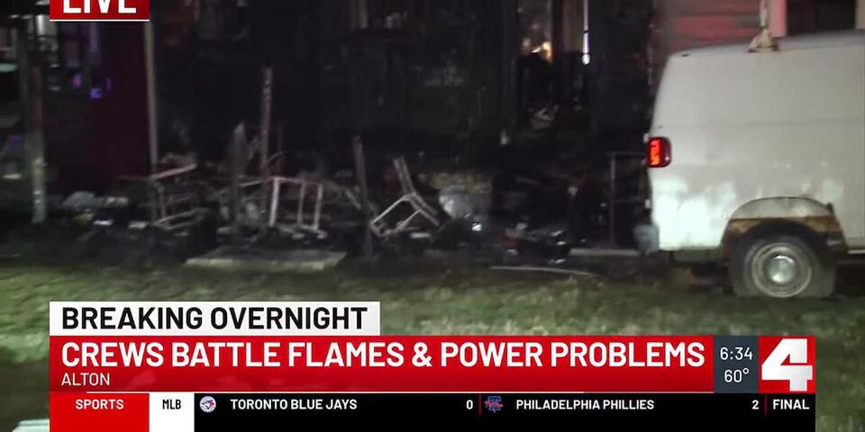 Powerline falls on firetruck in Metro East house fire, couple escapes ...