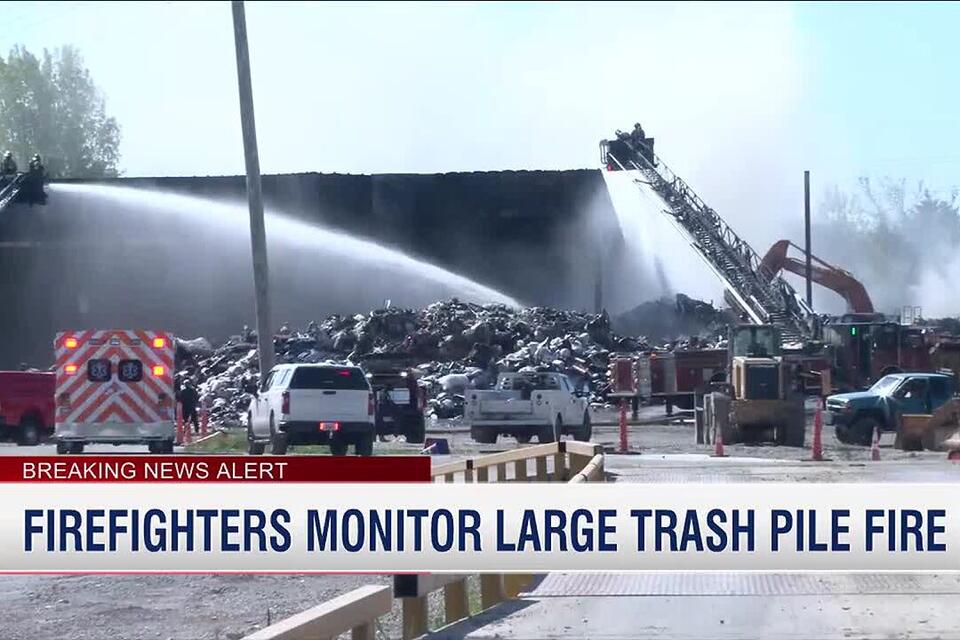 Large trash pile on fire in Bowling Green - NewsBreak