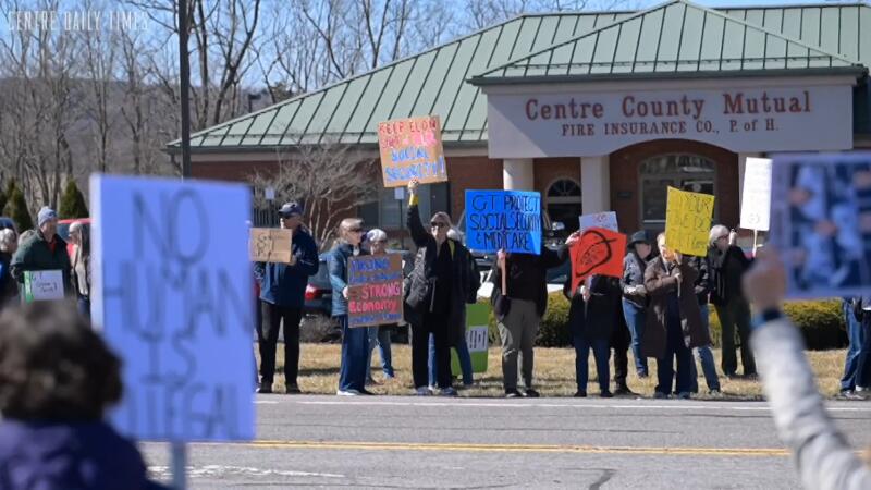 Protesters gather outside Congressman Thompson's office - NewsBreak