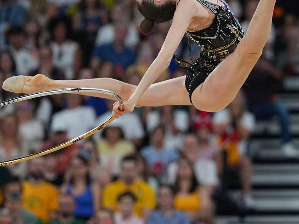 Flip Through the Differences Between Artistic and Rhythmic Gymnastics ...