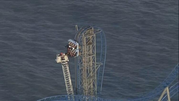 People stuck on roller coaster for over two hours, taken off one by one ...
