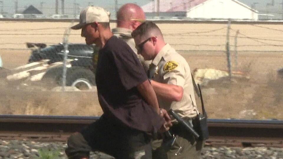 Two men arrested for attempting to burglarize shipping containers ...