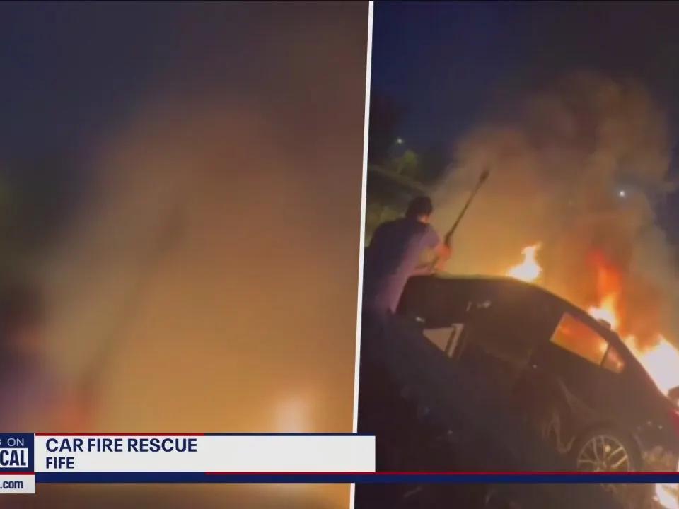 Video shows rescuers saving man trapped in burning Subaru