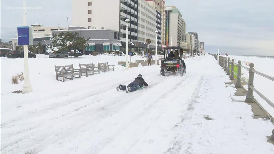 Sledding and skiing on Virginia Beach boardwalk after winter storm ...