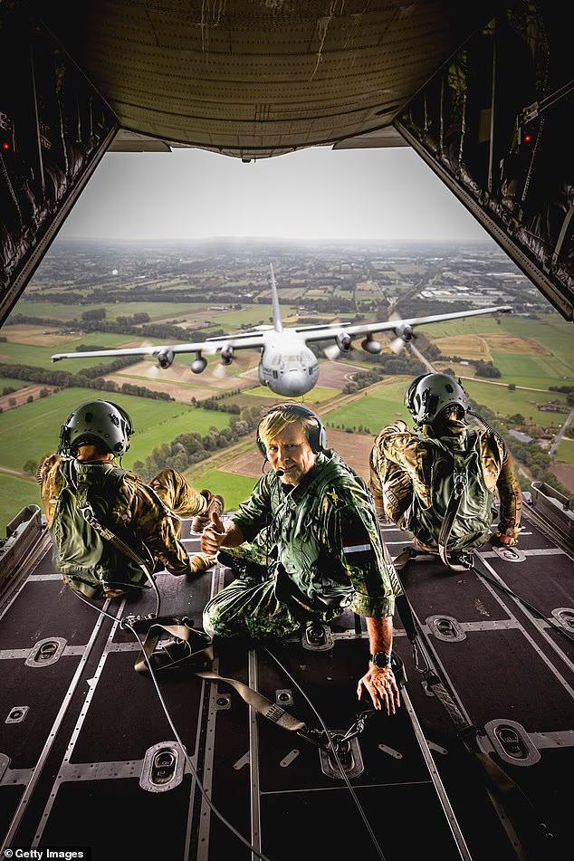 Beaming King Willem-Alexander of the Netherlands pilots an army plane ...