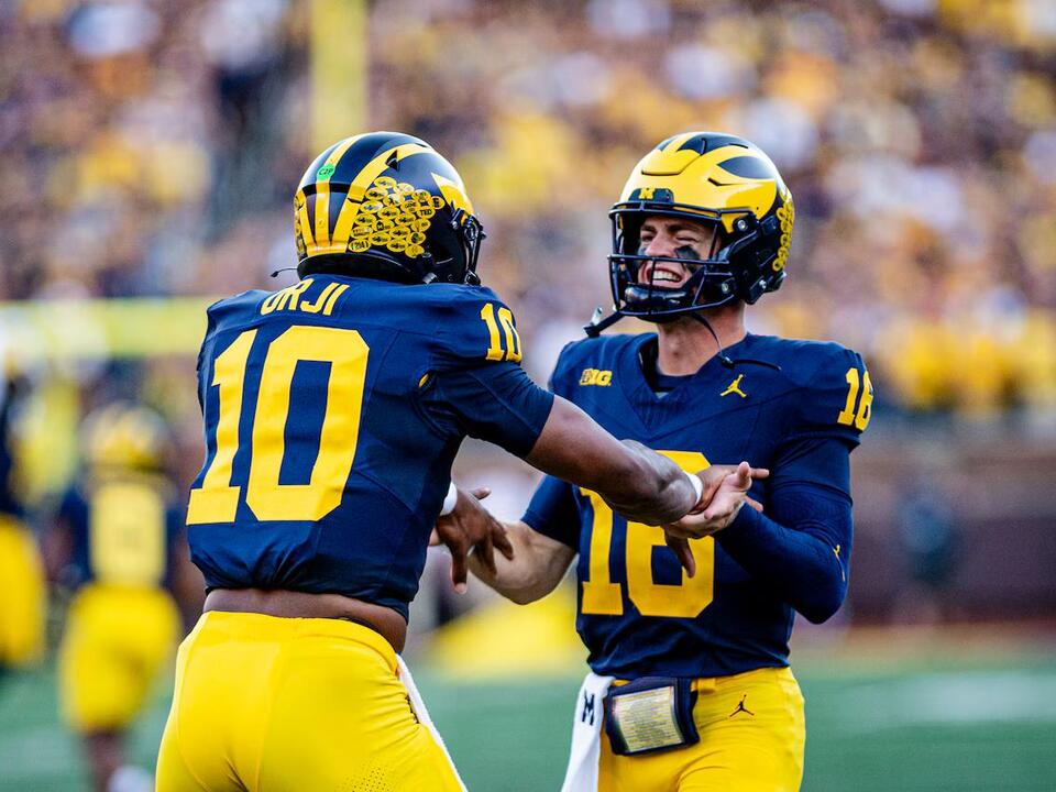 Davis Warren or Alex Orji? Michigan players sound unfazed over what’s next at QB