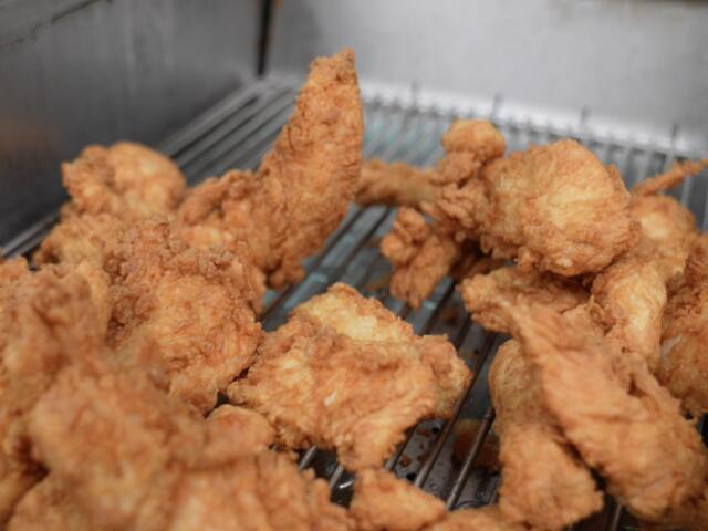 MD Food Bank is showing chicken tender, love, and care