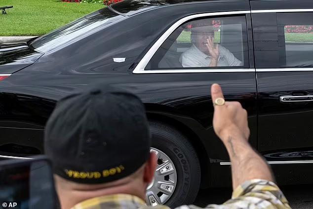 Trump rewards MAGA fans awaiting a glimpse of him with hot dogs and a ...