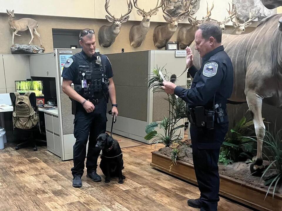 Two G.I. Police Department dogs sworn in for service Aug. 15