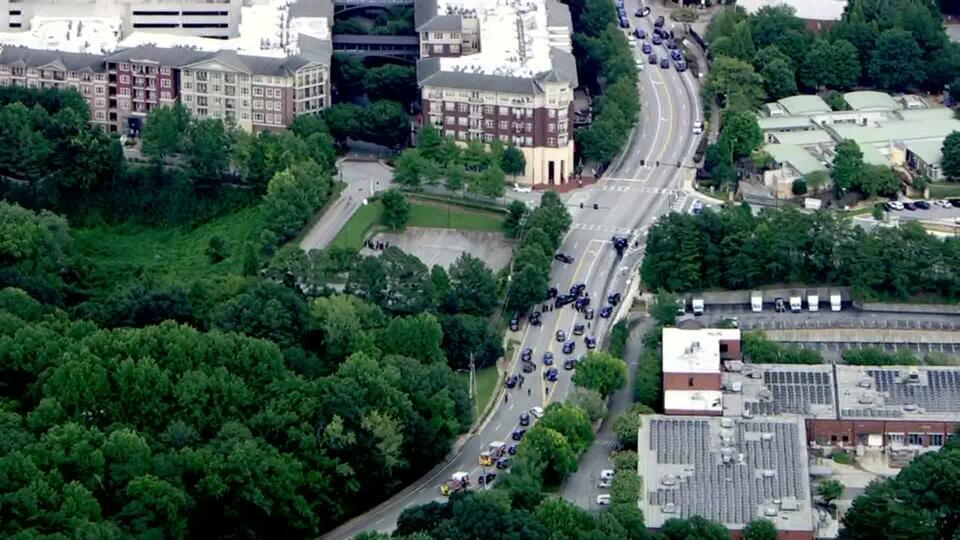 DeKalb County officer killed, suspect dead in shooting outside CDC ...