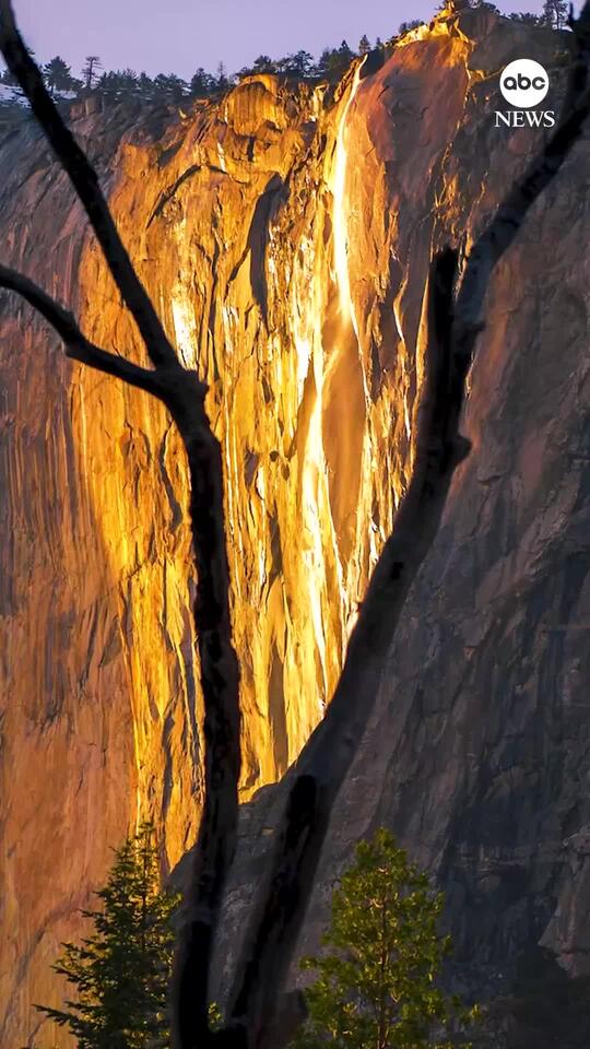 A waterfall illuminated by the sun created a visual “firefall in ...