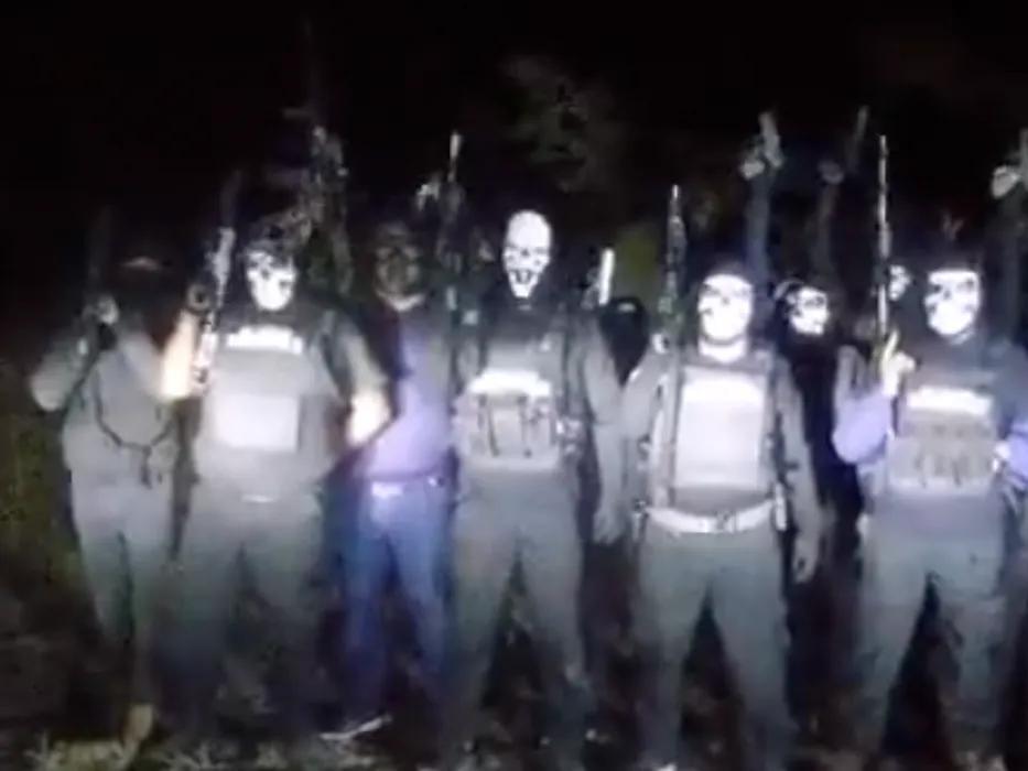 Terrifying gang in Halloween masks say they're going to 'purge' local ...