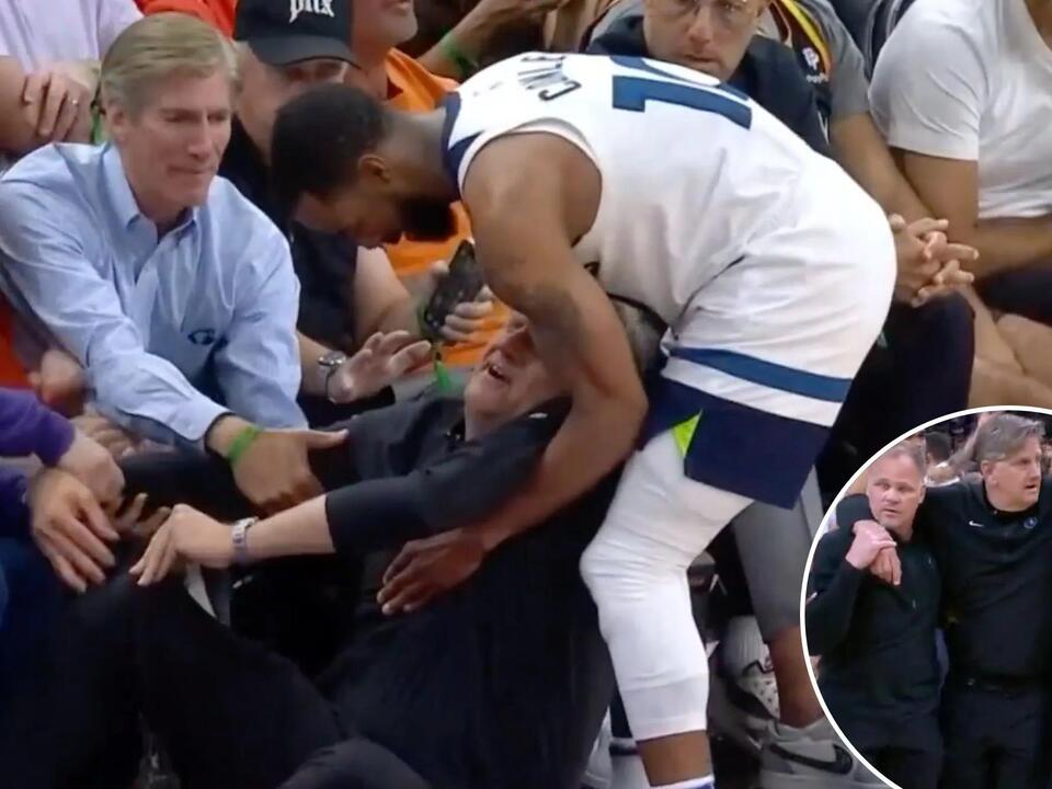 Timberwolves coach Chris Finch carried off court after sideline ...