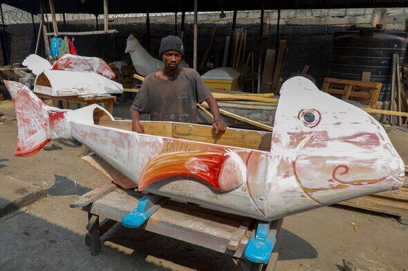 Ghana's fantasy coffins: Photos show stunning caskets that celebrate ...
