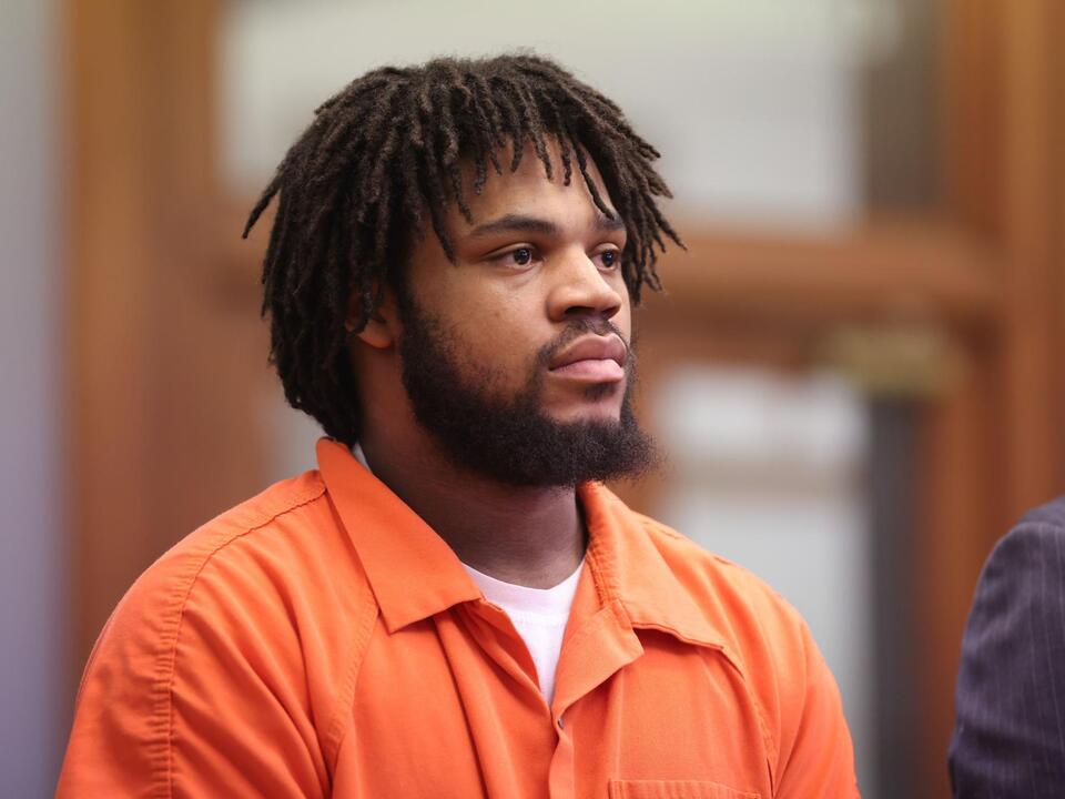 Man convicted in killing of girlfriend's former beau gets early release