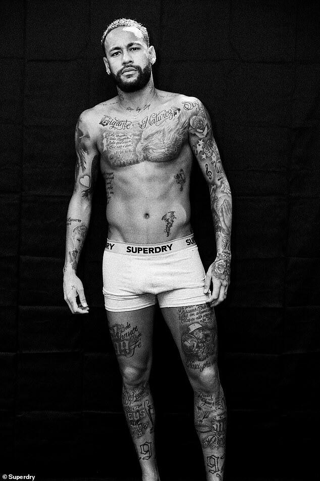 Neymar displays his VERY ripped physique as he poses for shirtless snaps to unveil Superdry's ...