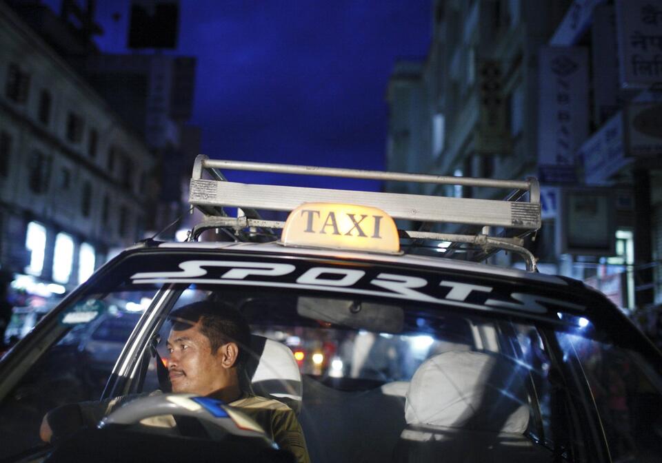 Kathmandu is making taxi drivers switch to EVs. Not all drivers can ...