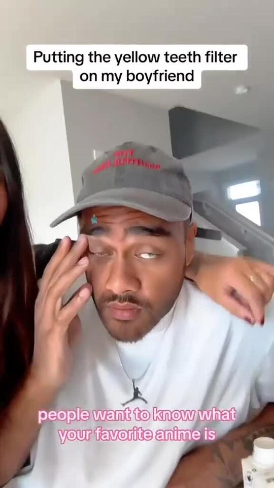 Putting the yellow teeth filter on my boyfriend - NewsBreak