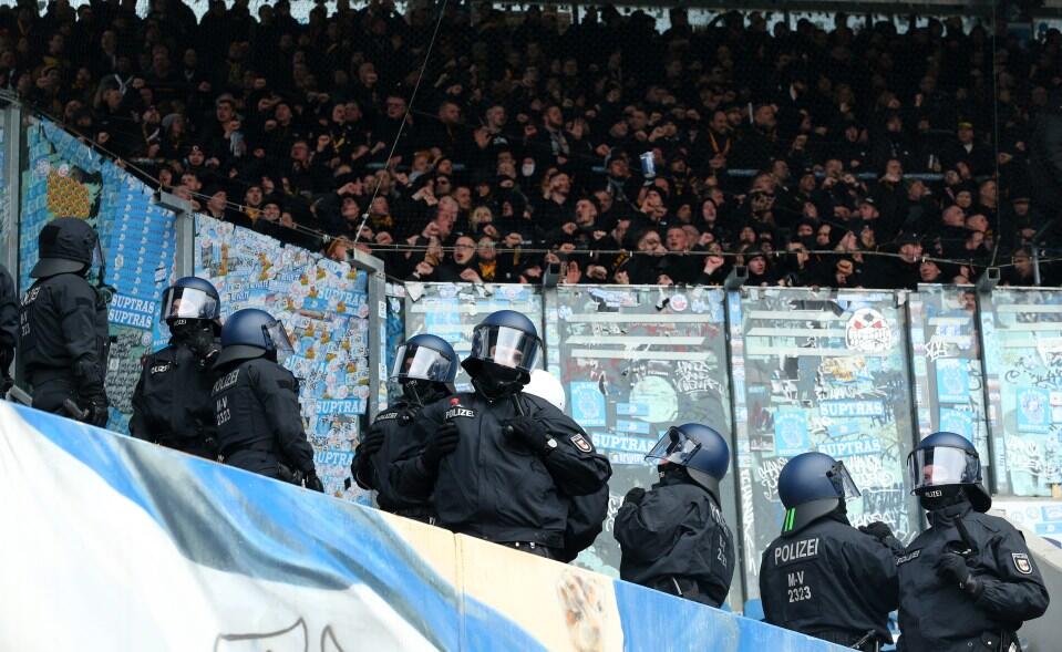 German clash suspended as riot police deployed after FIREWORKS thrown ...