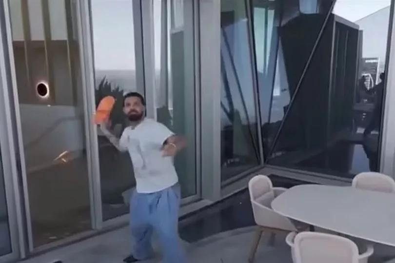 Drake ATTACKS mysterious drone as it flies into Sydney penthouse - but ...