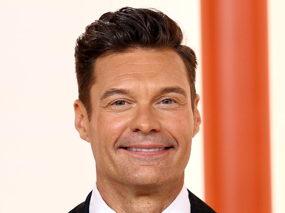 Ryan Seacrest's kitchen features a copper backsplash, vertical storage ...