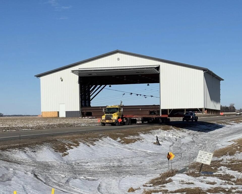 North Dakota troopers escort semi truck hauling 81 foot wide building ...