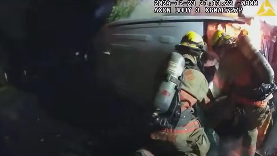 Police video shows Ore. firefighters rescuing woman in burning vehicle ...