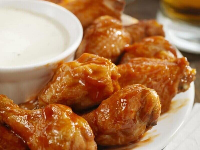 Americans to Eat 1.48 Billion Chicken Wings for Super Bowl LX - NewsBreak