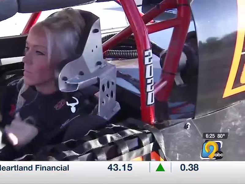 Stacy Olson, one of the only women at Hawkeye Downs, revs into an even ...