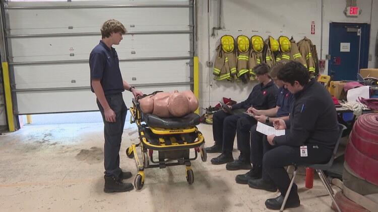 High school EMT trainers render aid for injured student - NewsBreak