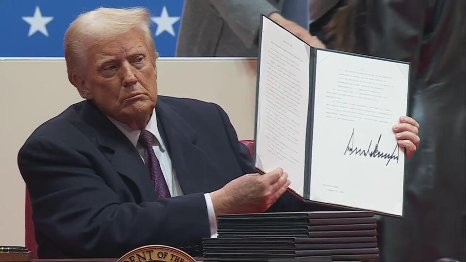 Trump signs dozens of executive orders at Capitol One Arena - NewsBreak