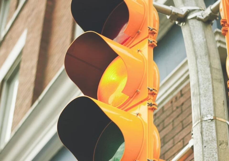 Yellow Light- Stop or Floor It? Here's What the Law Really Says - NewsBreak