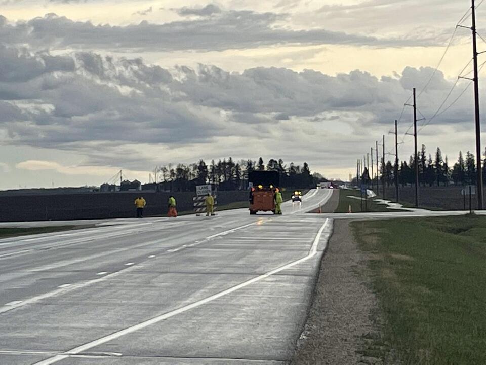 Wind blows semi truck over on Highway 56