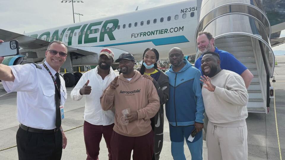 Marine veteran stops Frontier passenger from opening door mid-flight ...