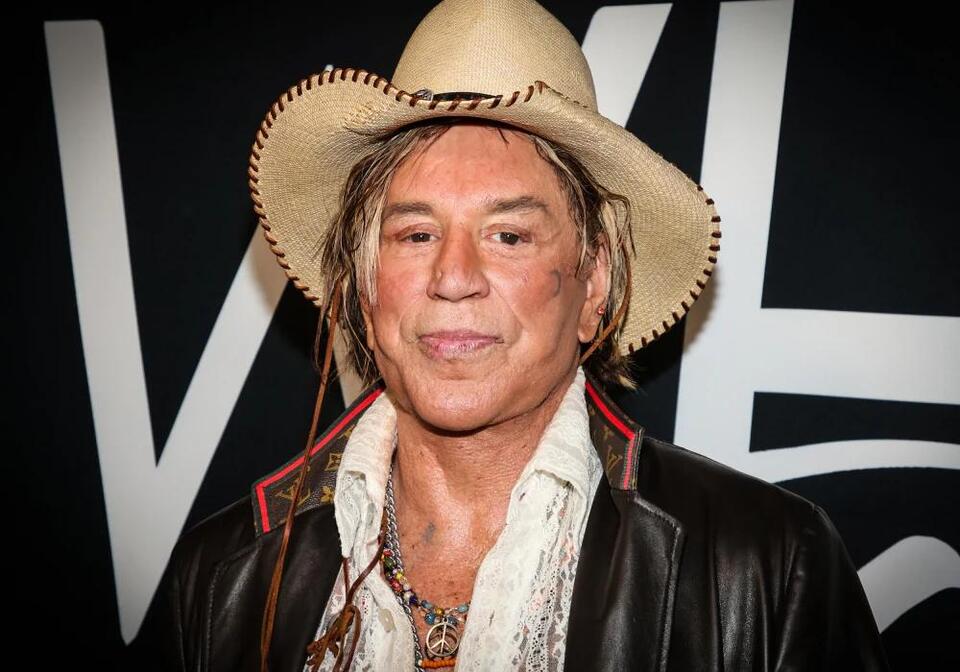 Mickey Rourke wrestling with bills, appealing to fans for help on back ...
