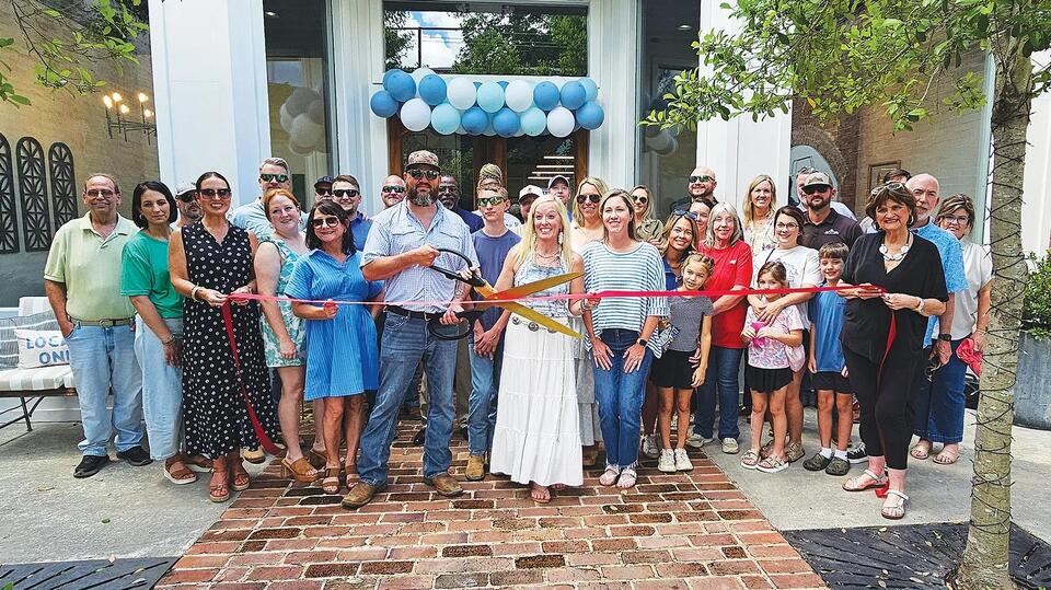 Local Collective snips the red ribbon - NewsBreak