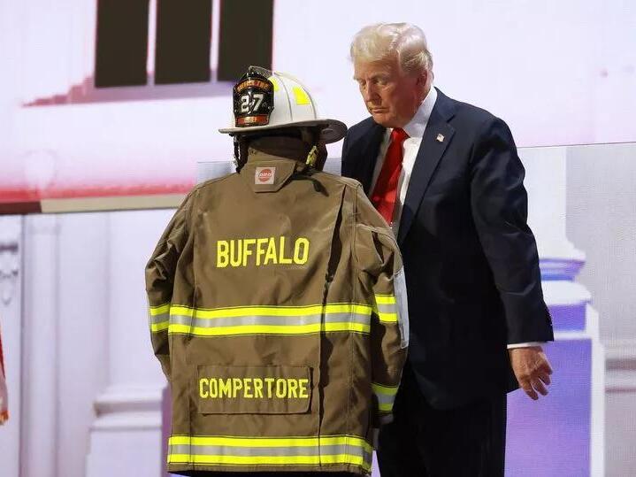 Trump poses with uniform of firefighter killed at rally with misspelled ...