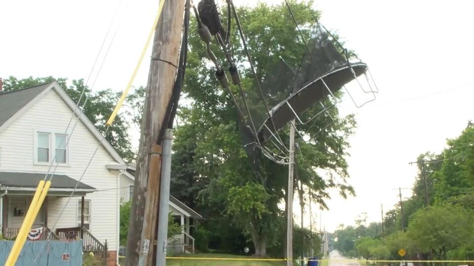 Trampoline thrown into power lines by storm winds in Ohio - NewsBreak