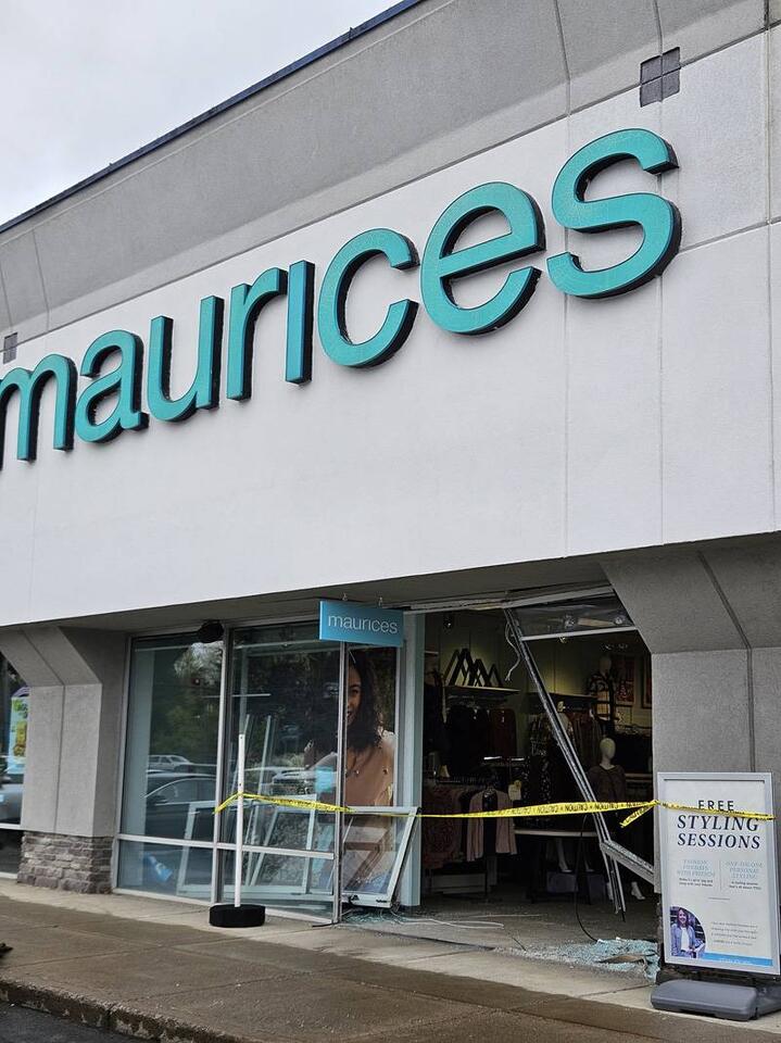 Photo: Car slams into retail store in Batavia, minor injury - NewsBreak