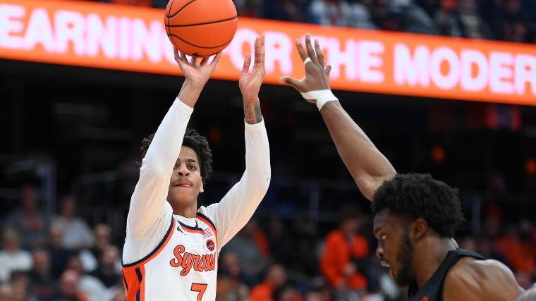 Kiyan Anthony puts a Miami defender on a poster as dad Carmelo Anthony ...