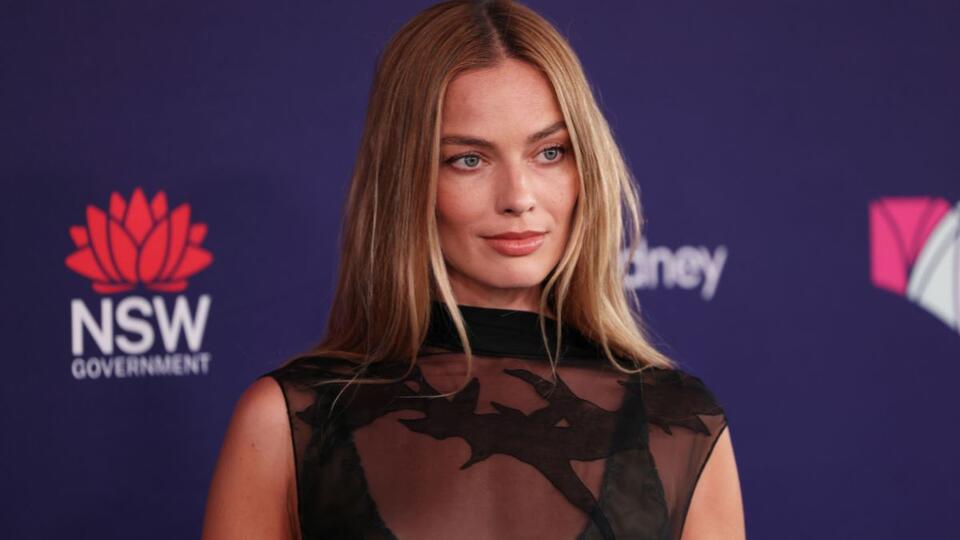 Margot Robbie in Fully Sheer Chanel Top Will Cure Your Monday Blues ...