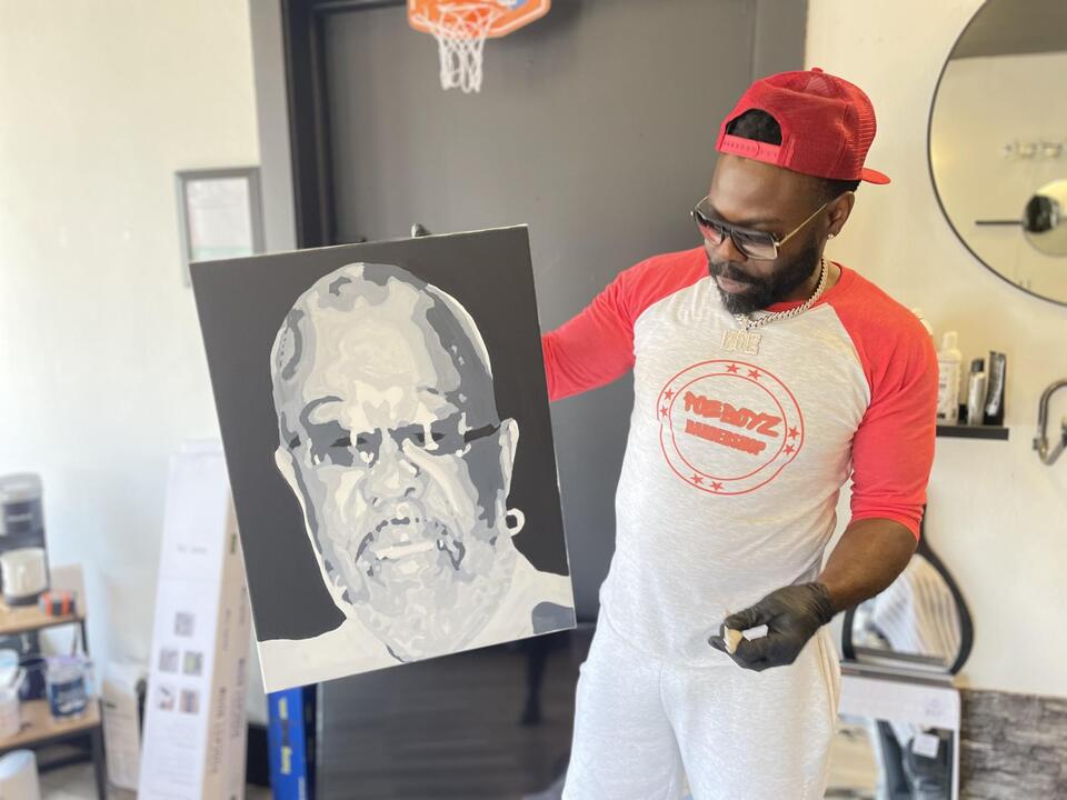 Milwaukee barber builds up fathers and sons at grand opening